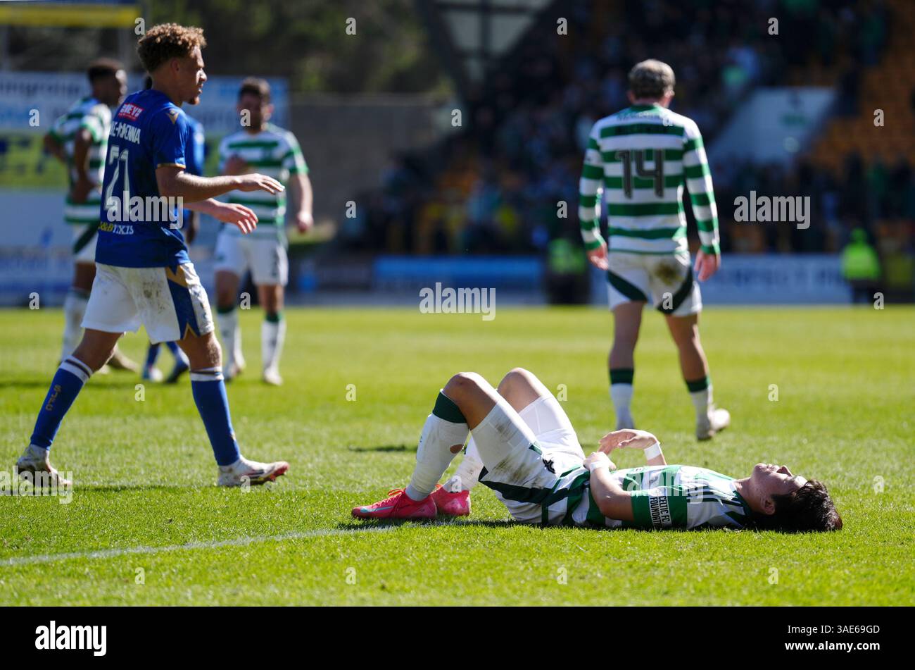 Celtic's Yang Hyun-Jun lies on the pitch during the William Hill ...