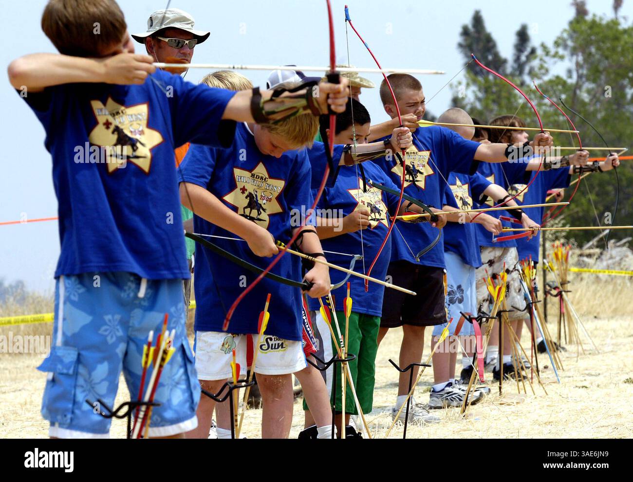 Cub Scouts learn how to use a bow and arrow during an archery class at ...