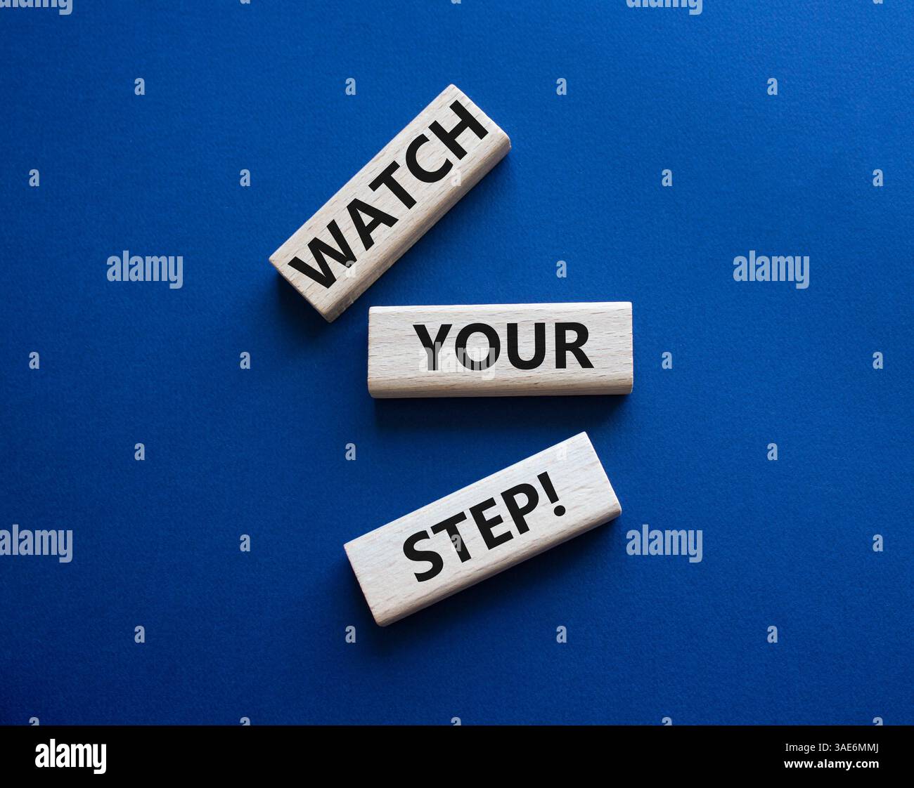 Watch your Step symbol. Concept words Watch your Step on wooden blocks ...