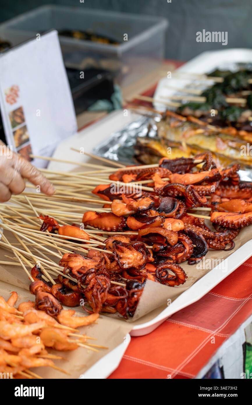 Fresh octopus skewers displayed hi-res stock photography and images - Alamy