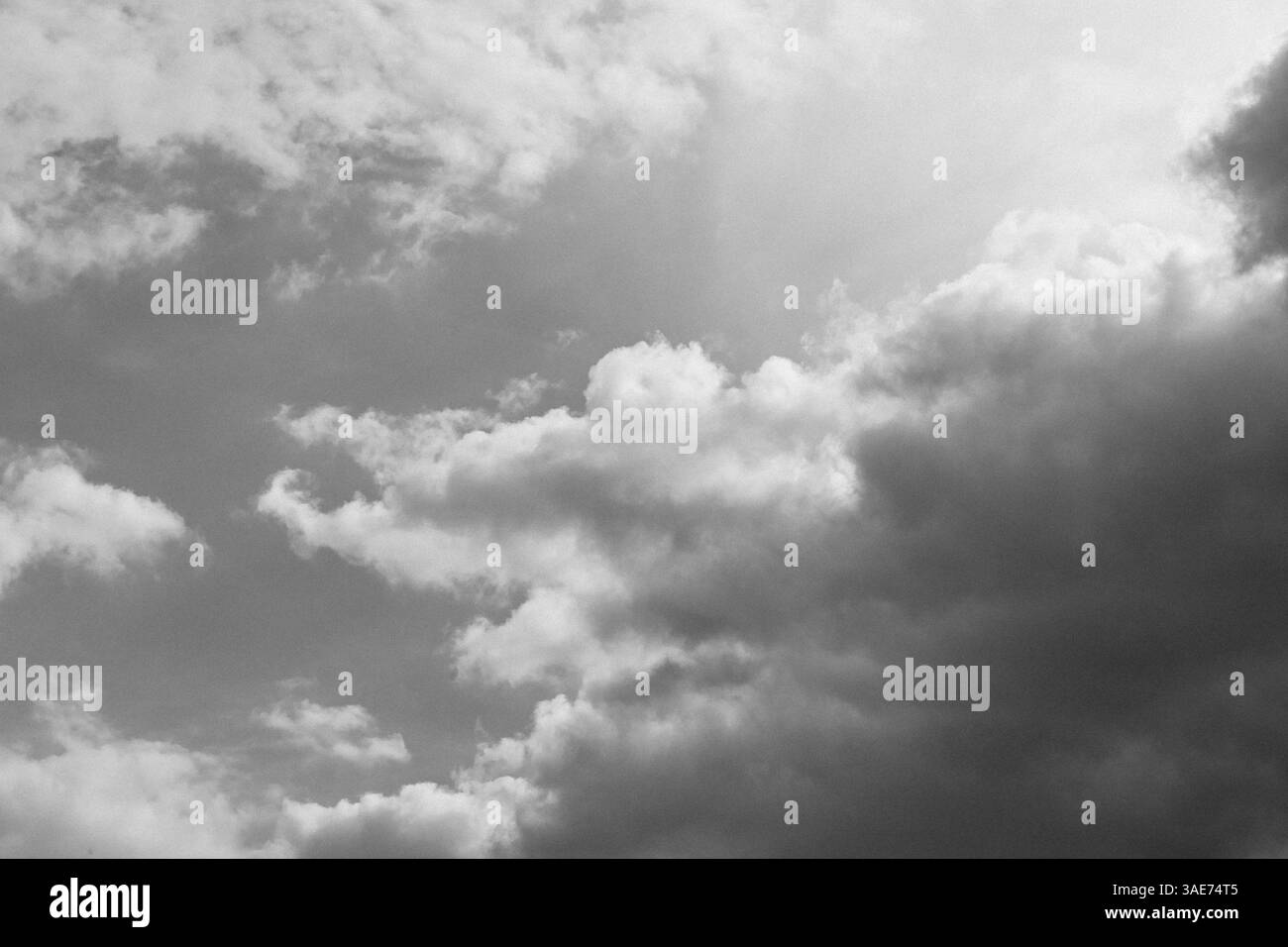 Dramatic black and white clouds photographed as high-resolution texture. Idea for background or ...