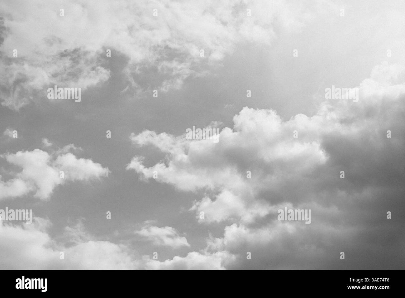 Dramatic black and white clouds photographed as high-resolution texture. Idea for background or ...