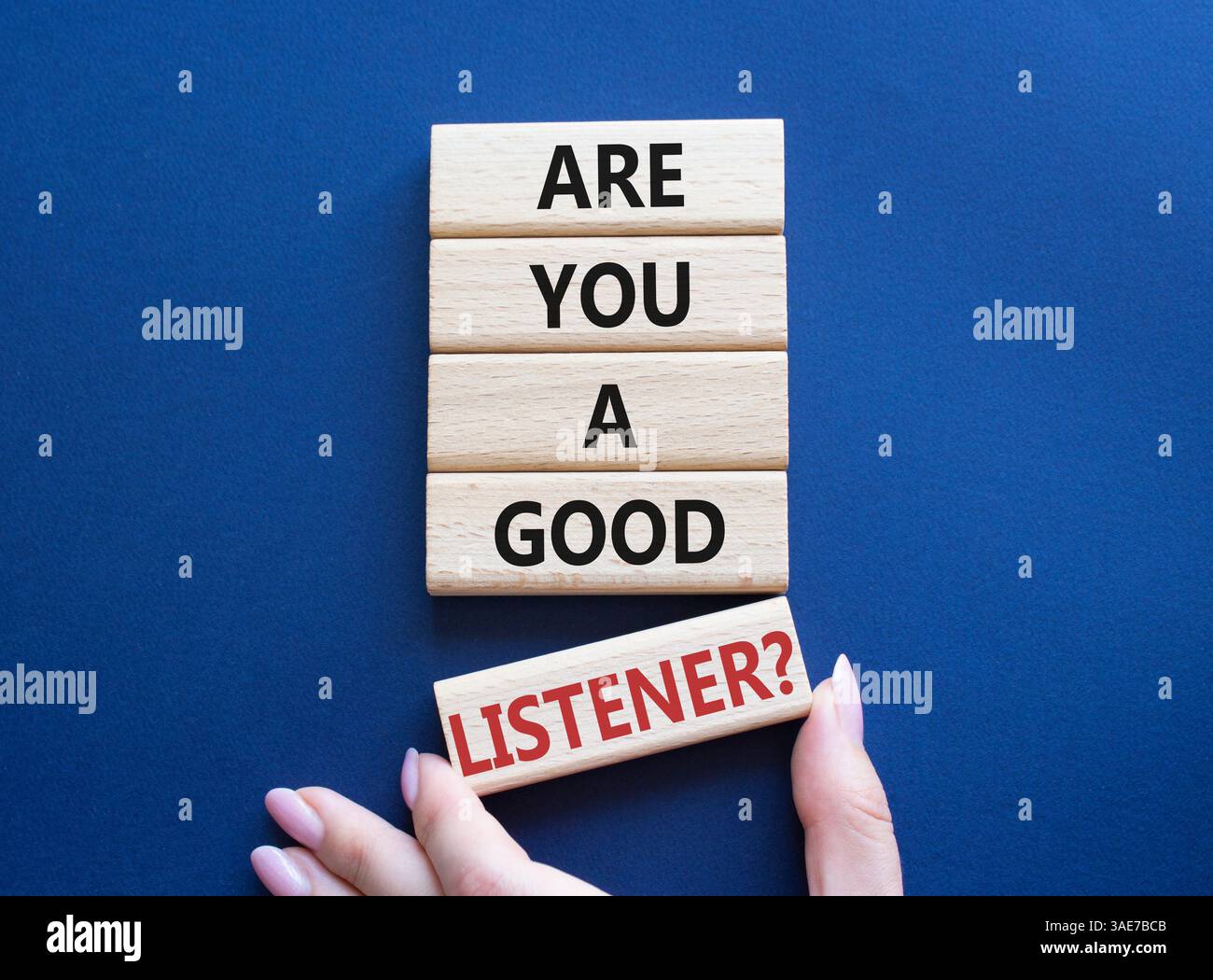 Listening skills symbol. Wooden blocks with words Are you a good ...