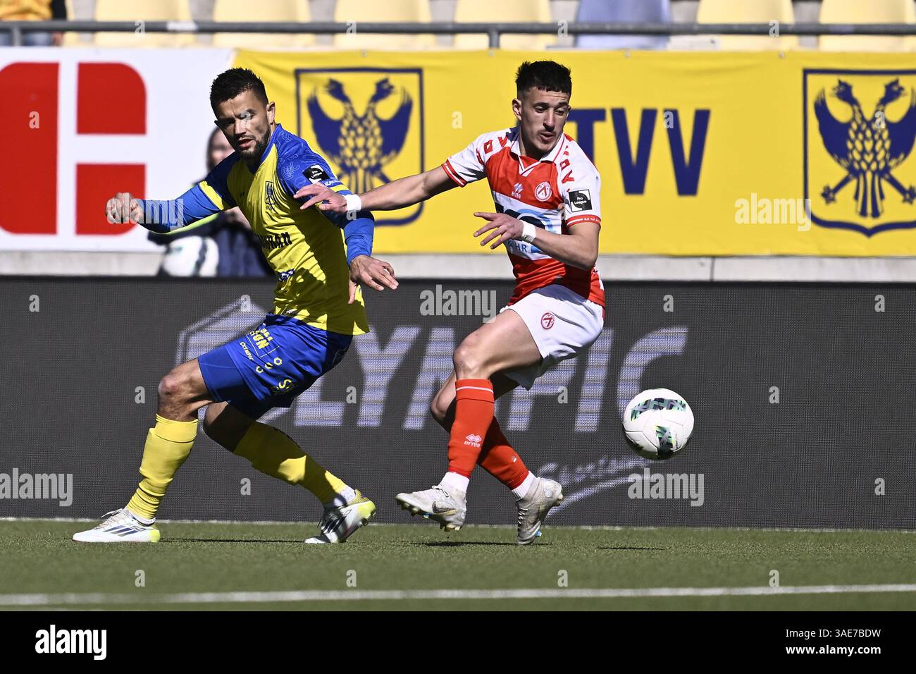 Sint Truiden, Belgium. 06th Apr, 2025. STVV's Visar Musliu and Kortrijk ...