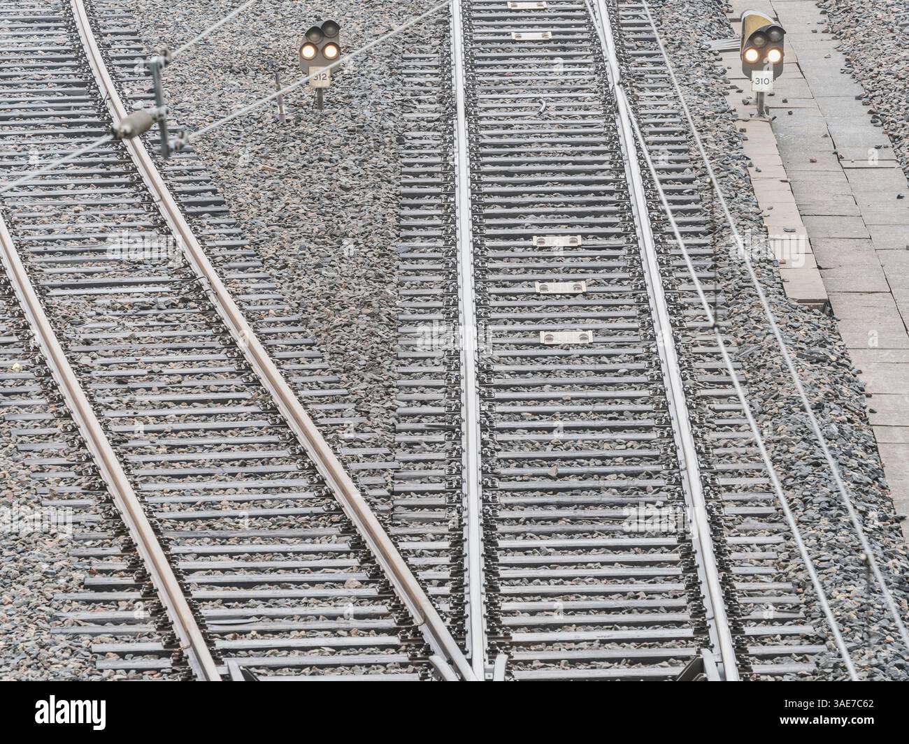 Railway tracks intersect at Gothenburg station, surrounded by gravel ...