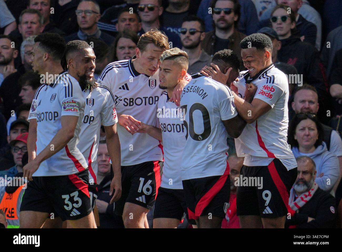 Fulham's Rodrigo Muniz, right, celebrates with teammates after scoring ...