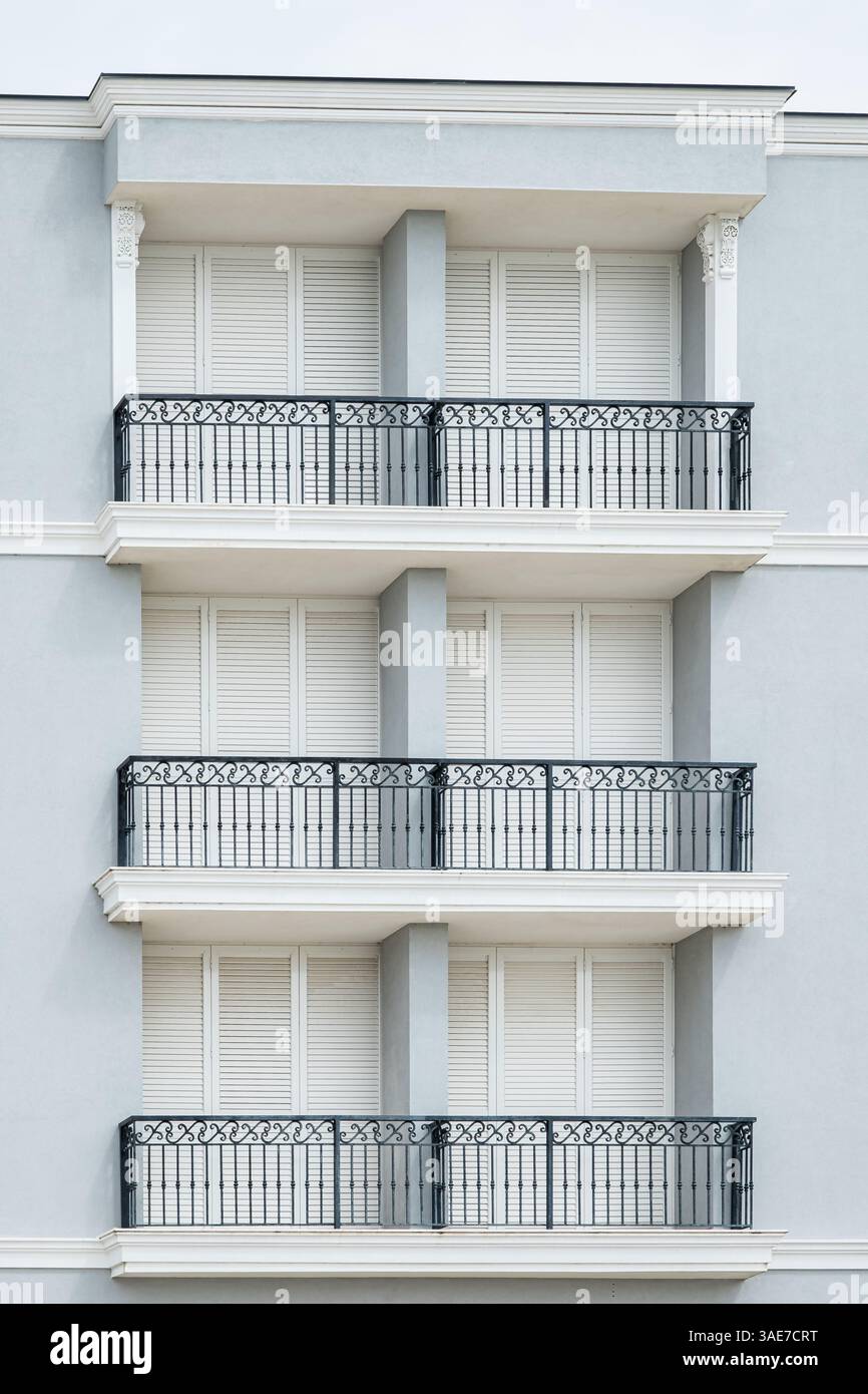 Modern residential building with balconies or terrace. European ...