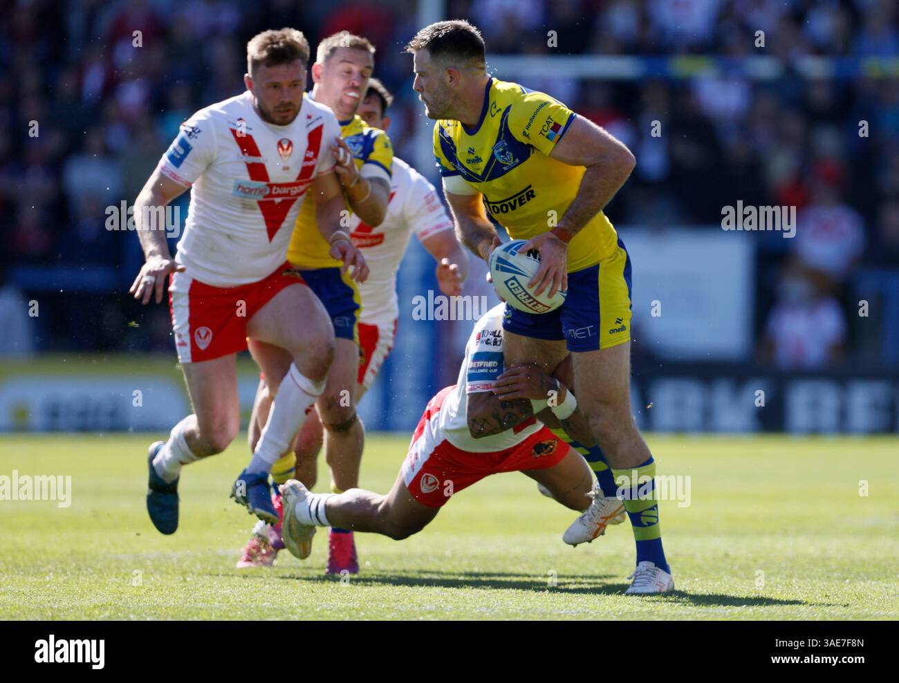 Warrington Wolves' Lachlan Fitzgibbon is tackled during the Betfred ...