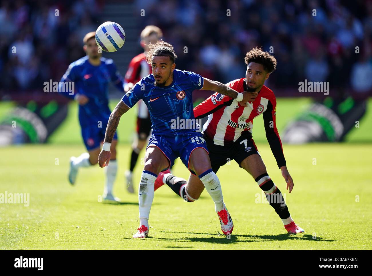 Chelsea's Malo Gusto and Brentford's Kevin Schade (right) during the ...