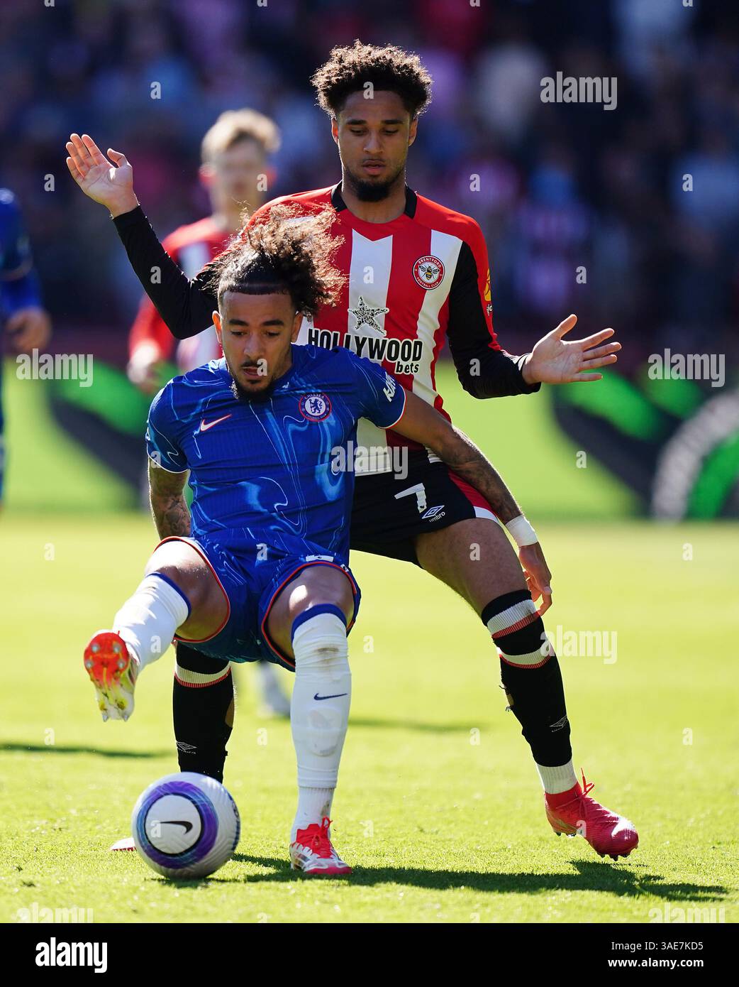 Chelsea's Malo Gusto and Brentford's Kevin Schade (right) during the ...