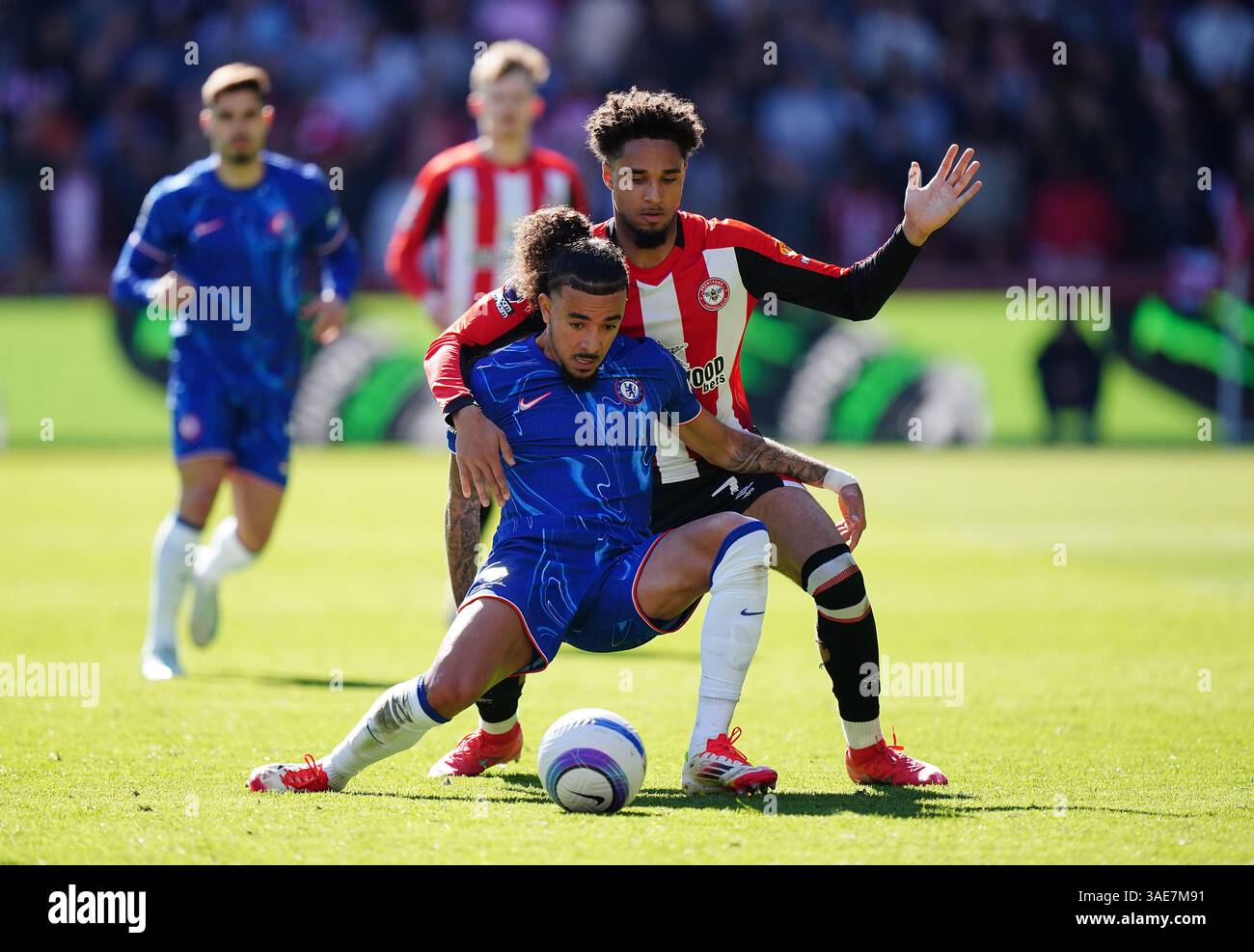 Chelsea's Malo Gusto and Brentford's Kevin Schade (right) during the ...