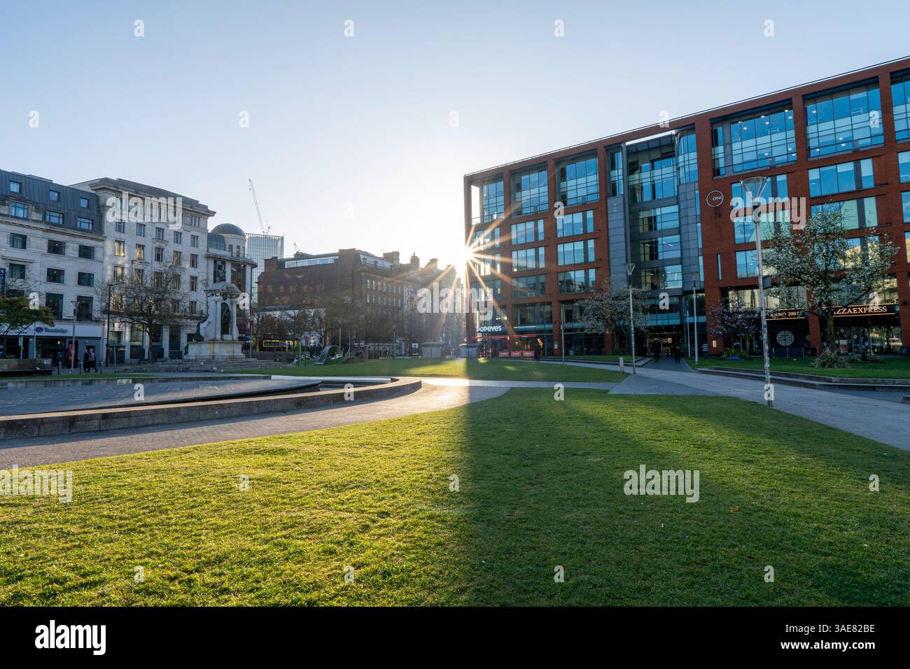 Image of a sunrise at Piccadilly Gardens Square in Manchester UK Stock ...