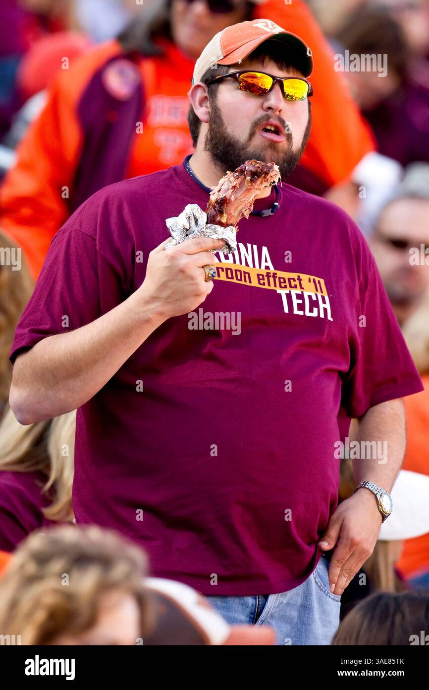 October 22, 2011: Virginia Tech Hokies fan looks on with a turkey leg ...