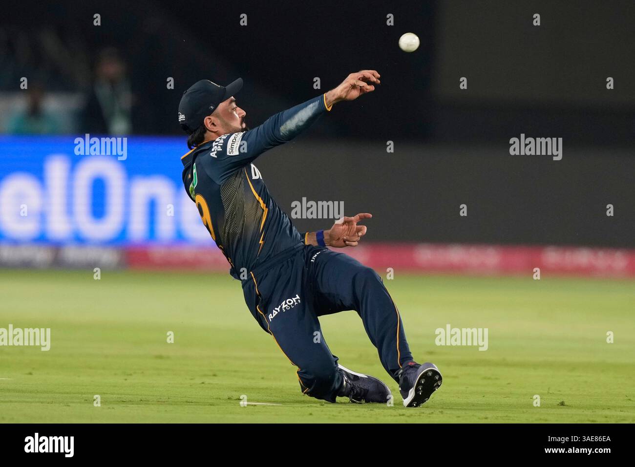 Gujarat Titans' Rashid Khan throws a ball during the Indian Premier ...
