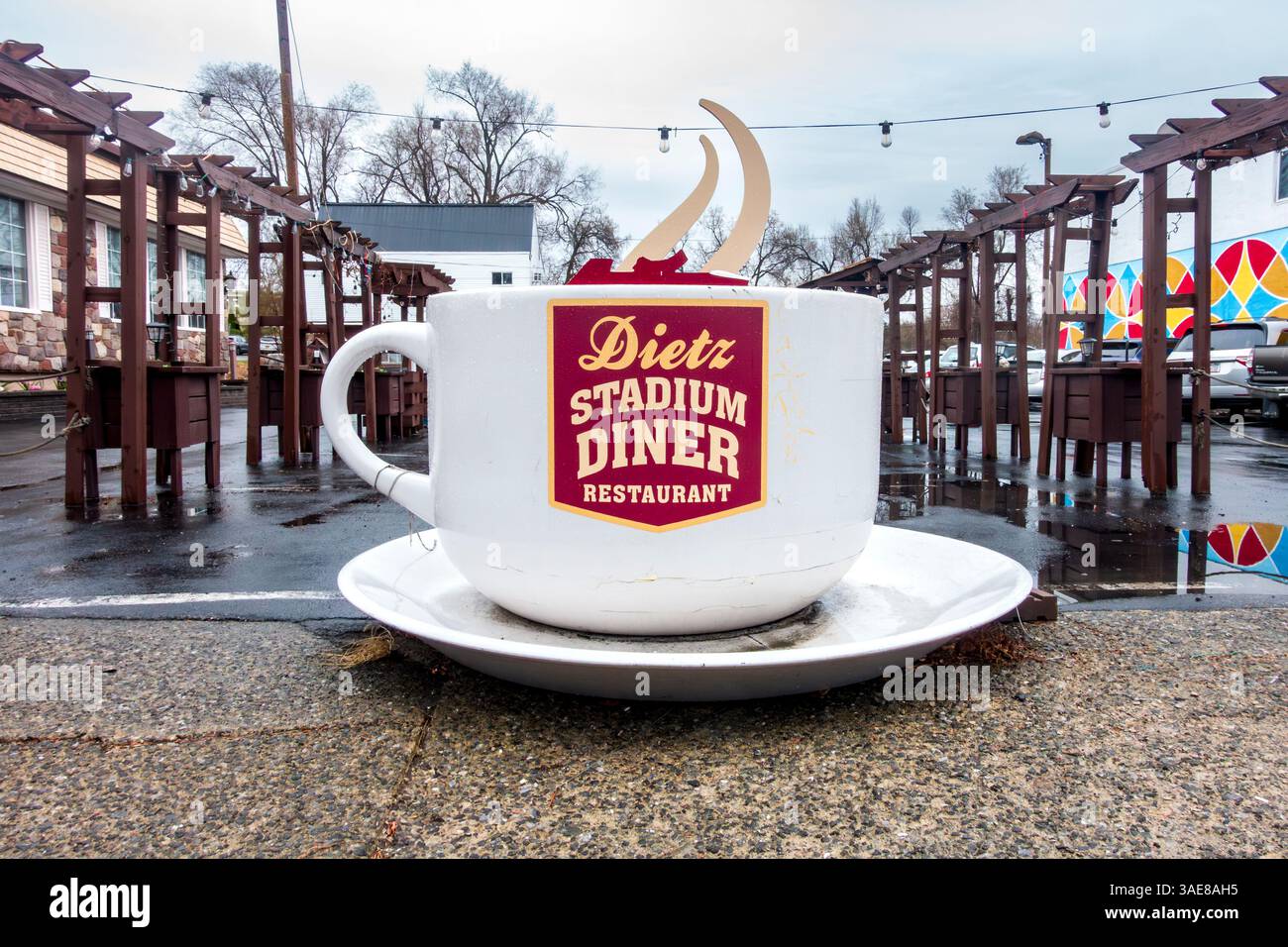 Kingston, NY - US - Apr 5, 2025 A giant coffee cup sculpture outside ...