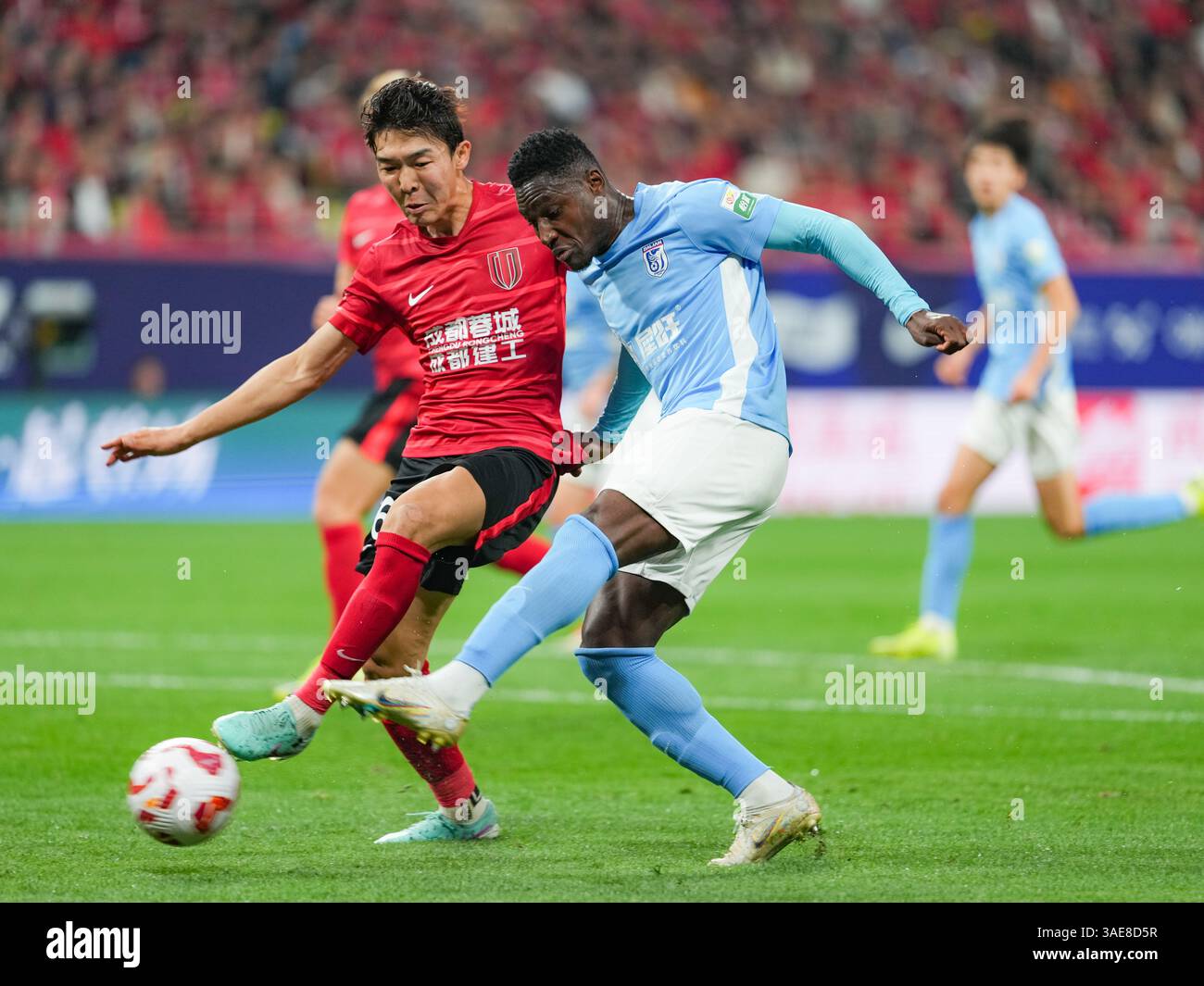 Chengdu, China's Sichuan Province. 6th Apr, 2025. Cephas Malele (R) of ...