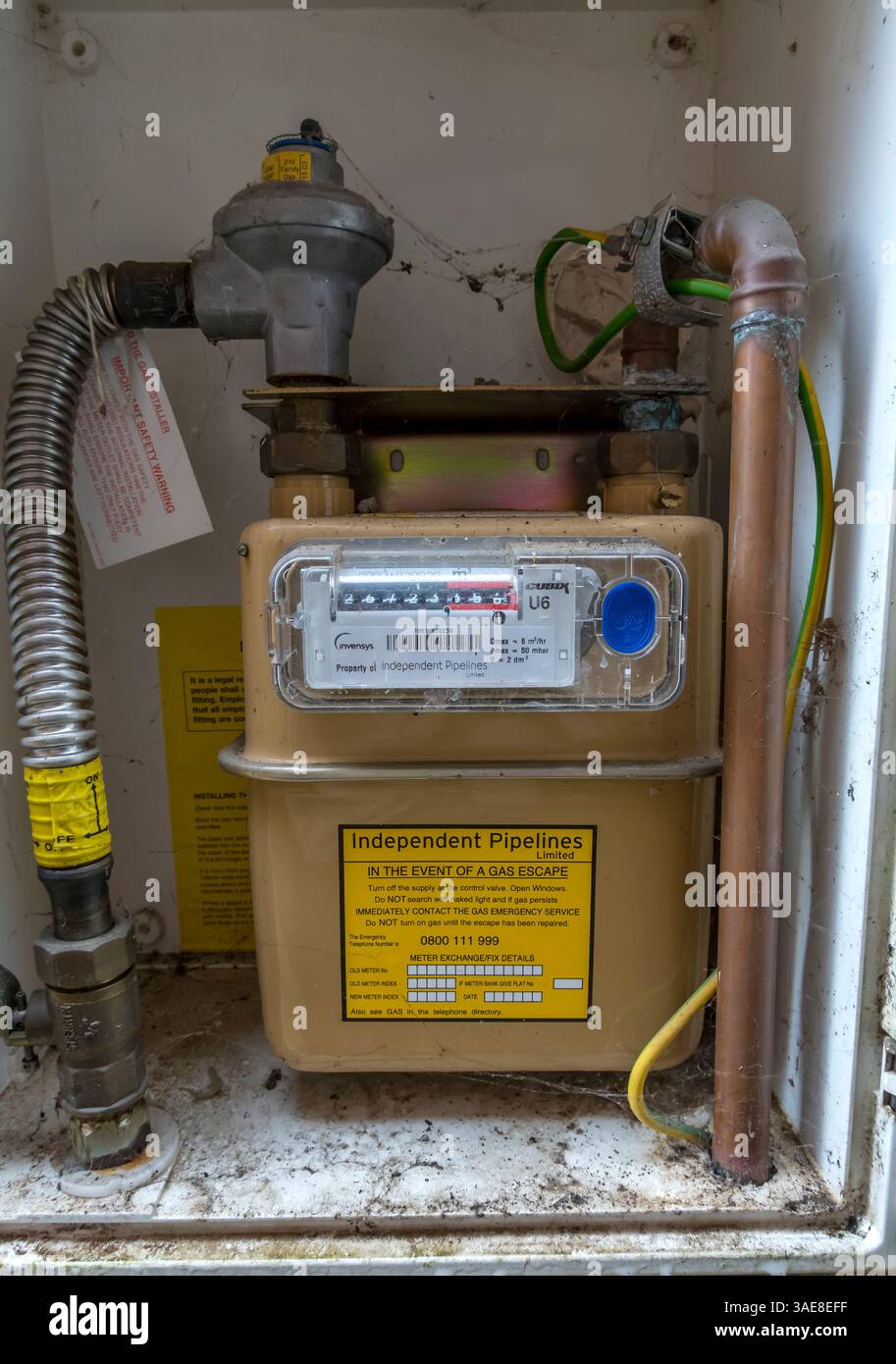 Gas meter in wall box Stock Photo - Alamy
