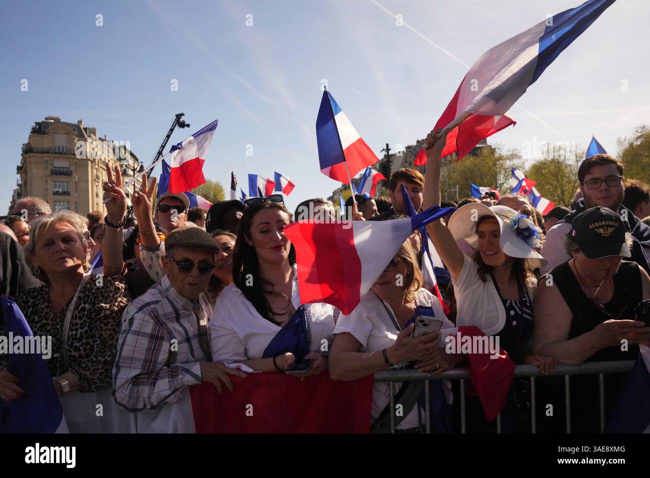 People attend at the French far-right party national rally in support ...