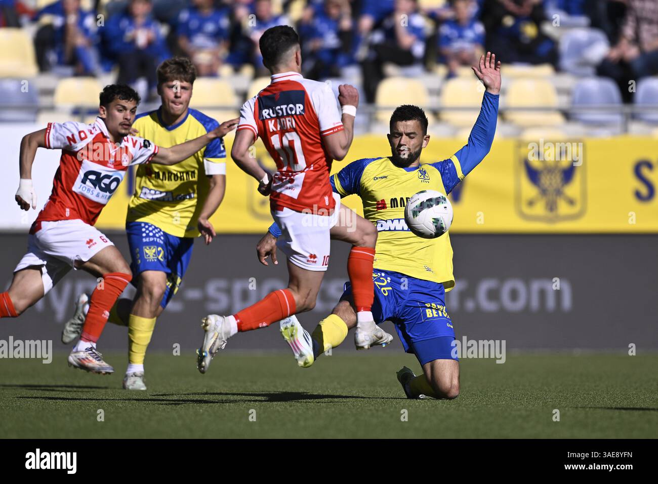 Sint Truiden, Belgium. 06th Apr, 2025. Kortrijk's Abdelkahar Kadri and ...