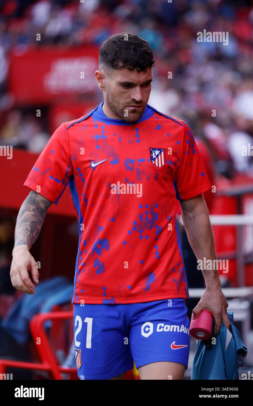 SEVILLE, SPAIN - APRIL 6, 2025: Javi Galán of Atlético de Madrid heads ...