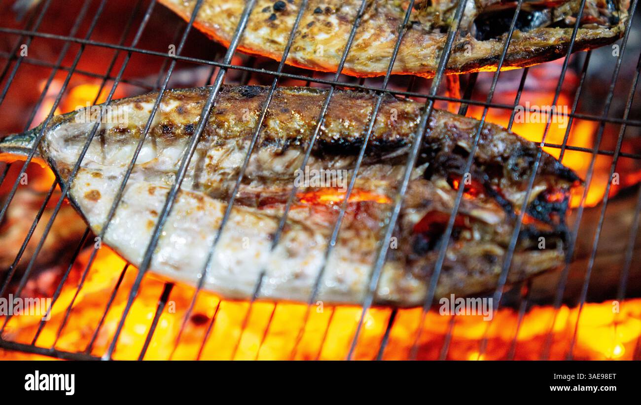 Grilled fish (ikan bakar) with soy sauce looks delicious and tasty ...