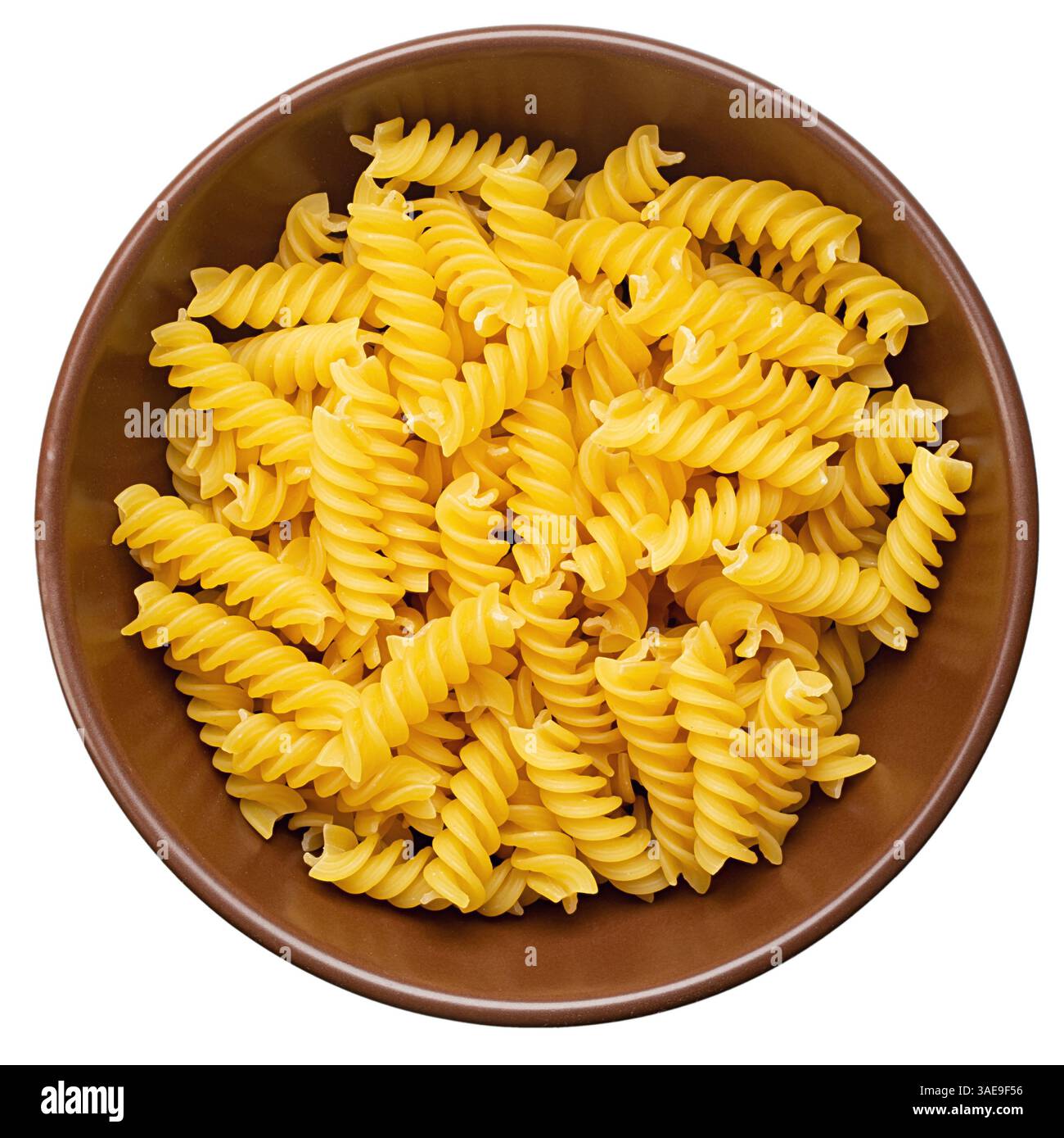 Raw pasta Fusilli in bowl isolated on white background. Raw and Dry ...