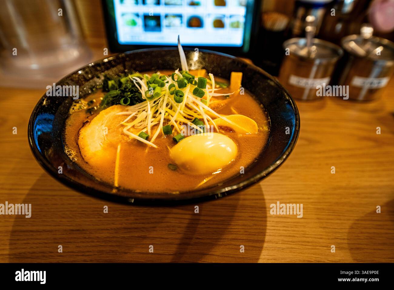 Miso-flavored tamago ramen with sliced pork and egg at a ramen shop in ...