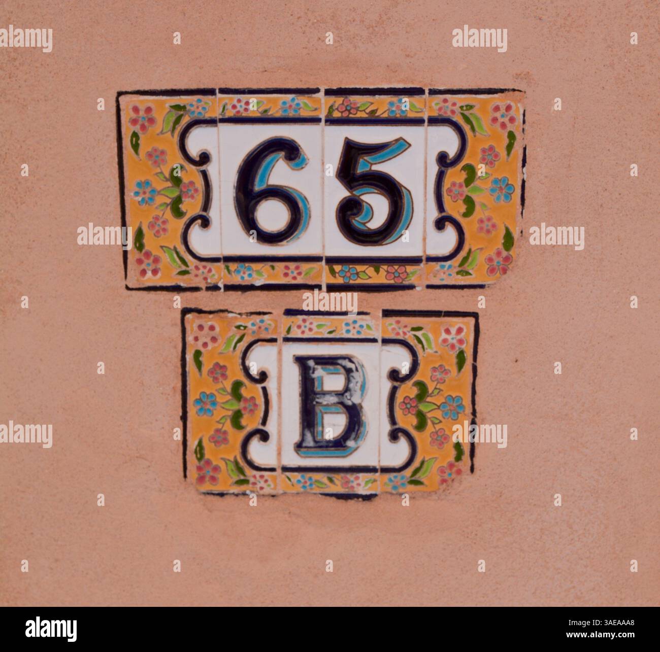 House number 65B sign Stock Photo - Alamy