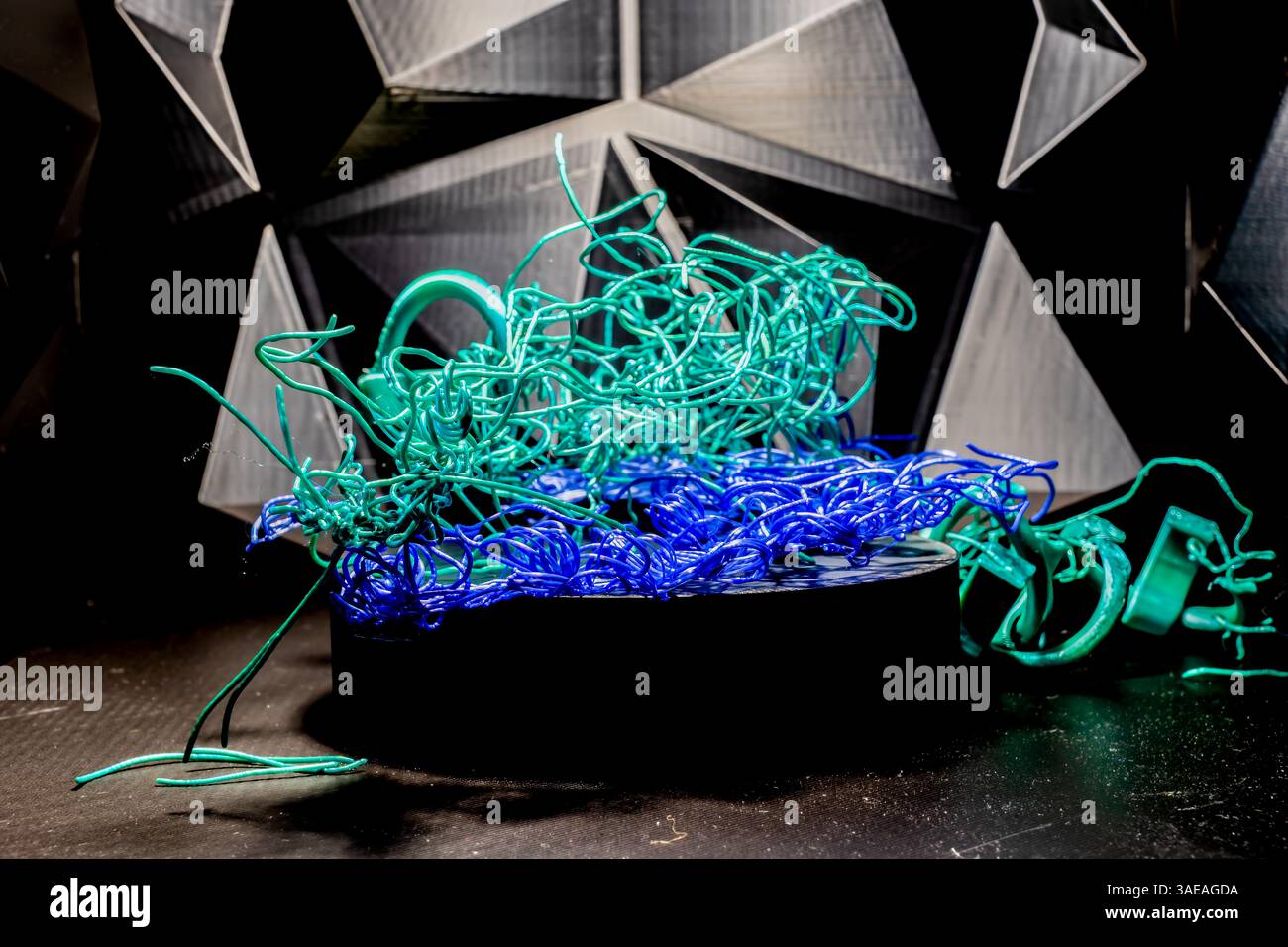 Massive spaghetti failure on a 3D printer caused by high temperatures ...