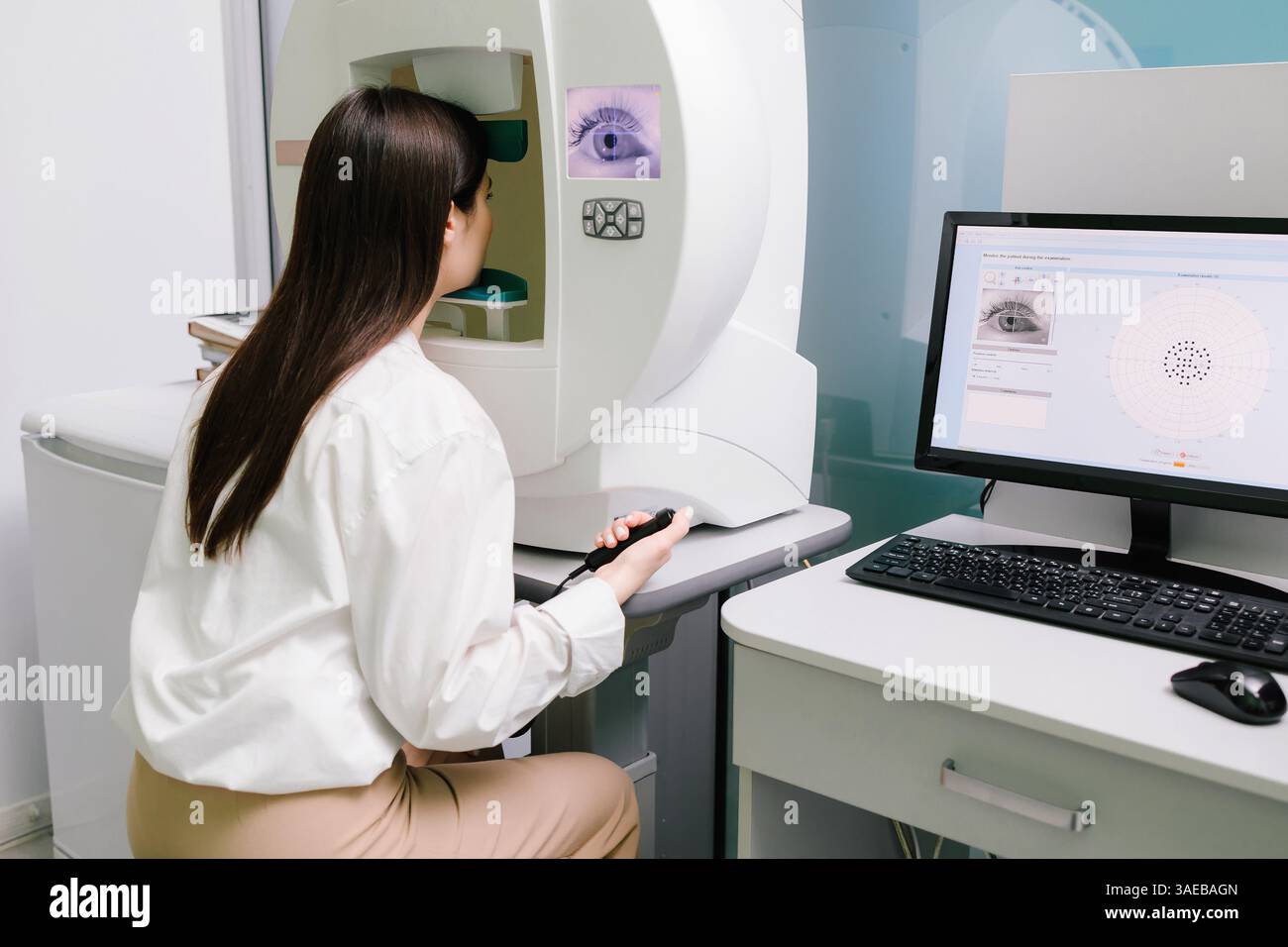 Perimetry eyes test for early sign of glaucoma of woman patient of ...