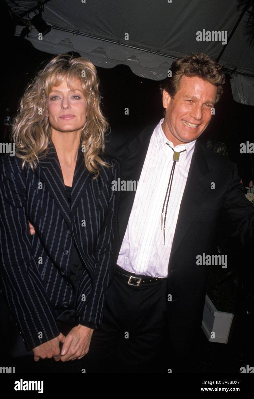 Mar 08, 1989; Los Angeles, CA, USA; Actor FARRAH FAWCETT with boyfriend actor RYAN O'NEAL at the ...