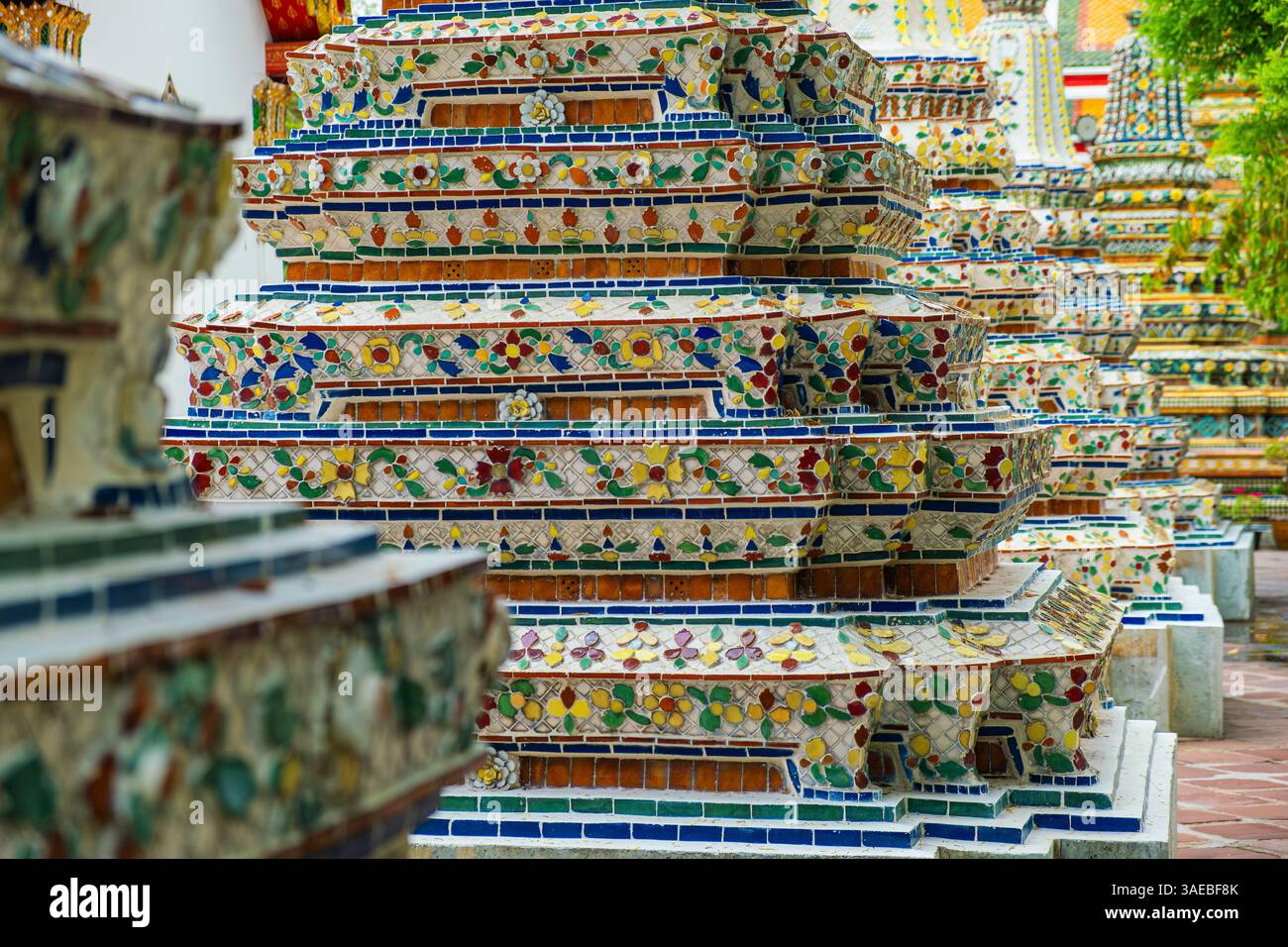 Intricate decorated bases of Buddhist stupas of Wat Pho Temple ornate ...