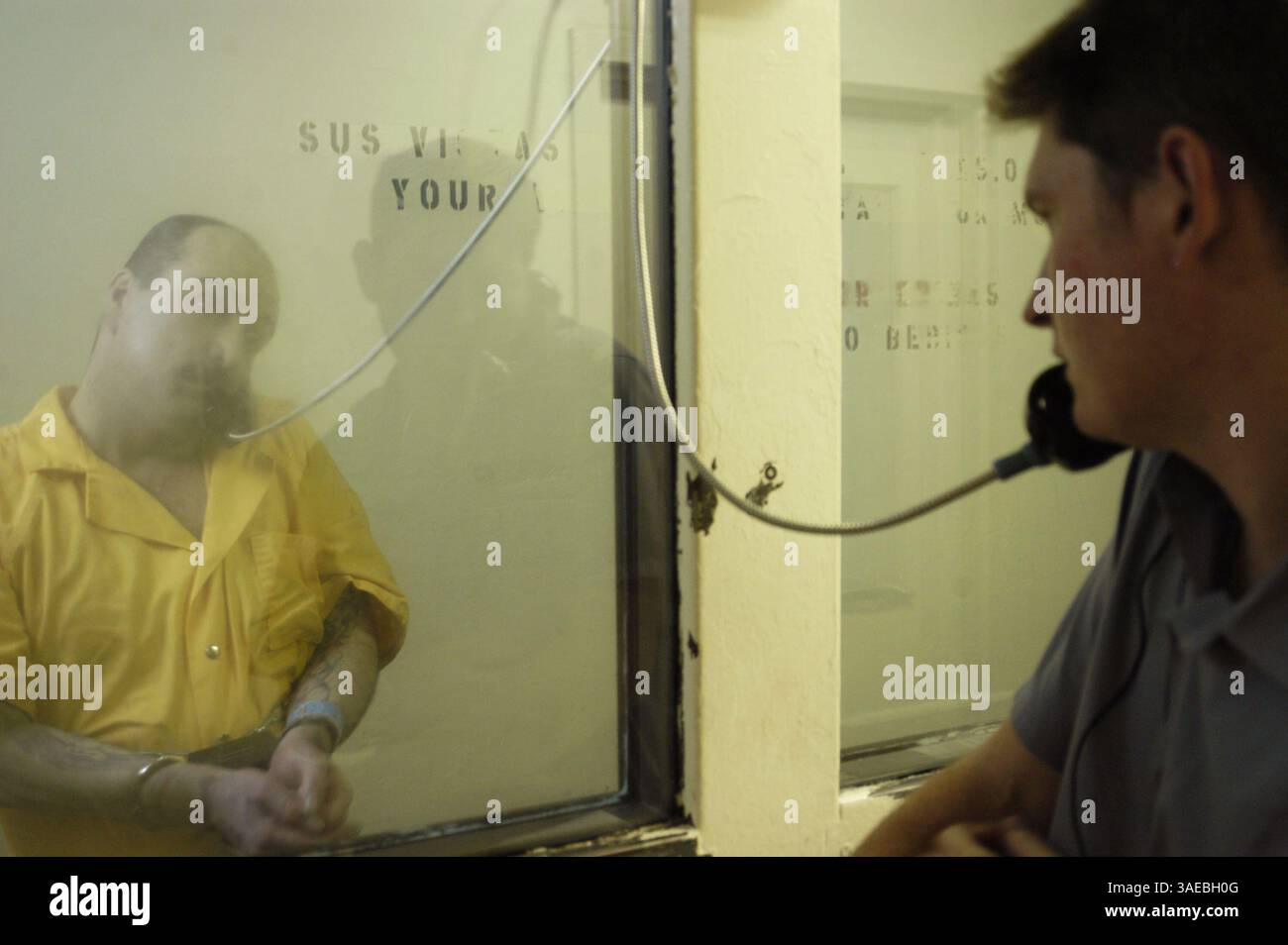 Man held in jail cell hi-res stock photography and images - Alamy