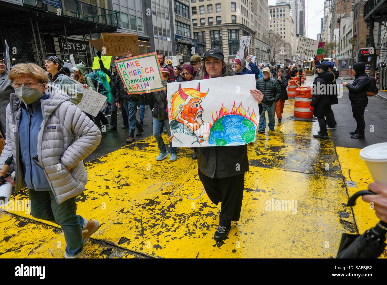 Thousands of protesters march down Fifth Avenue in New York on Saturday ...
