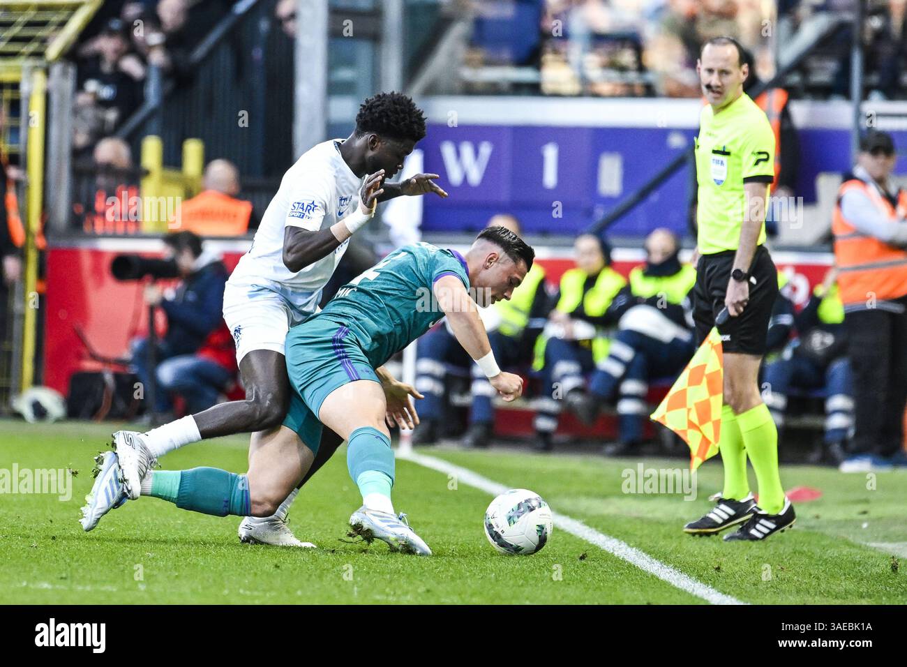 Brussels, Belgium. 06th Apr, 2025. Genk's Christopher Bonsu Baah and Anderlecht's Jan-Carlo ...