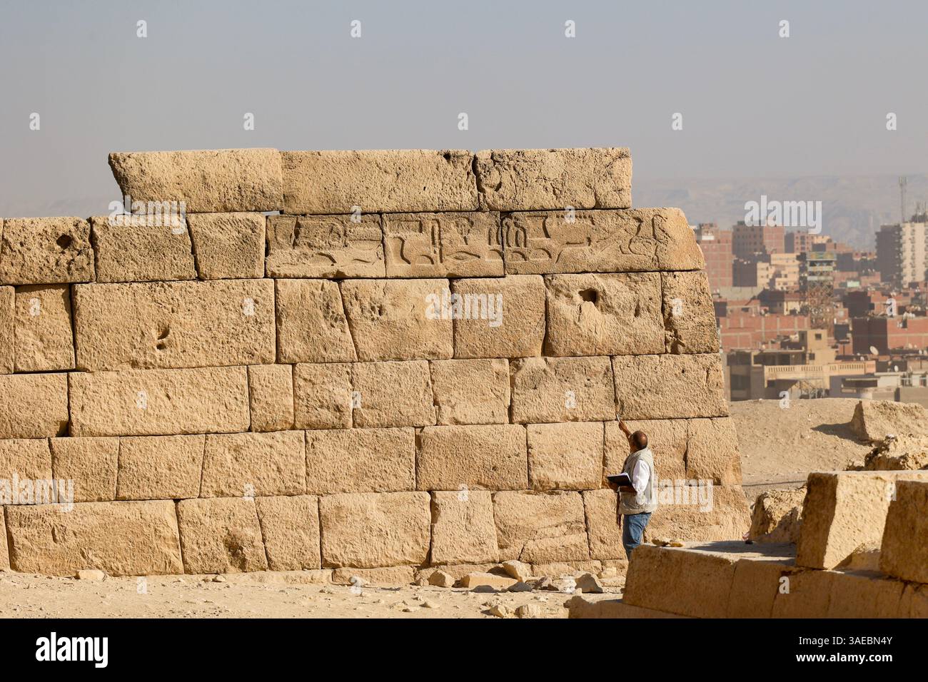 Man scientist historian admiring the historical heritage of the ...