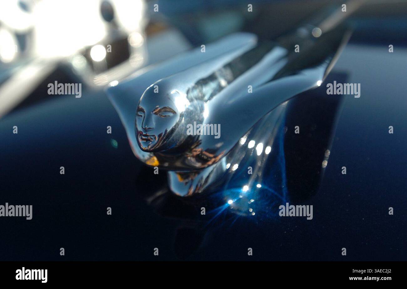 Hood ornament from a 1953 Cadillac shows a face. Members from the ...