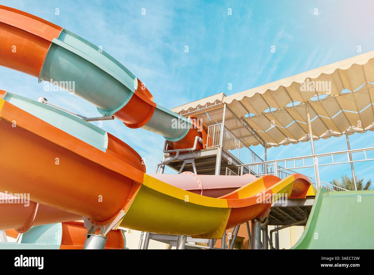 Water park with water colored flights, slides, splashes and pools at ...
