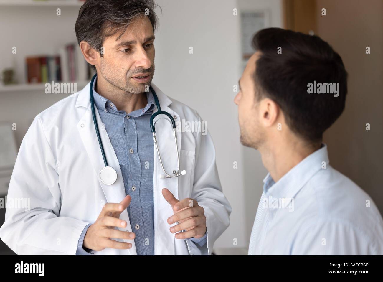 Doctor prescribing medicine during medical hi-res stock photography and ...