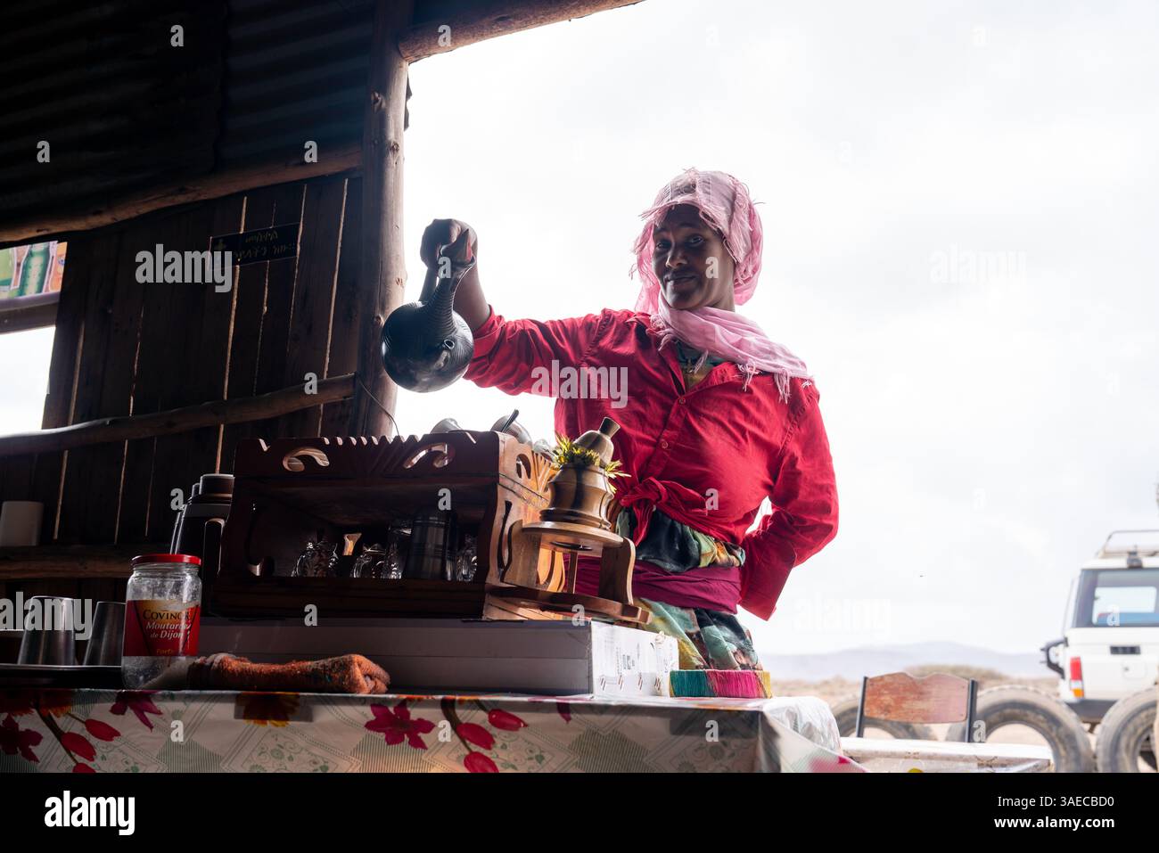 Woman serves food drink hi-res stock photography and images - Alamy
