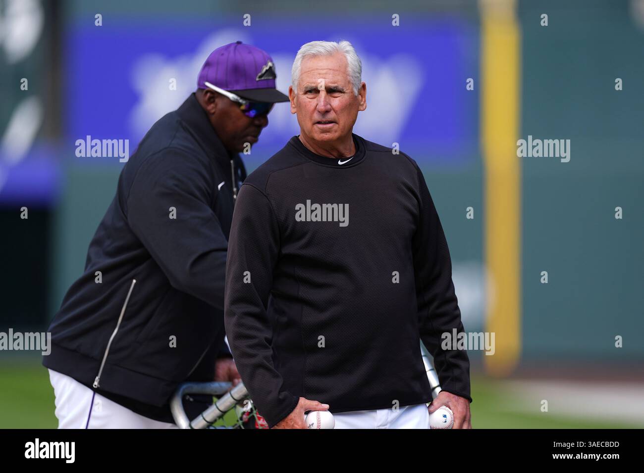 Colorado Rockies manager Bud Black (10) and hitting coach Hensley ...