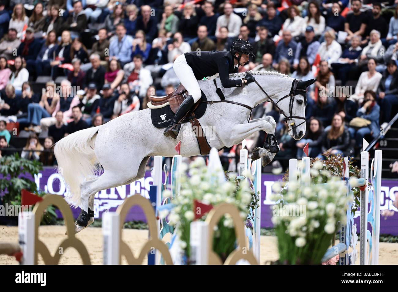 Martin FUCHS of Switzerland with Leone Jei during the Longines FEI ...