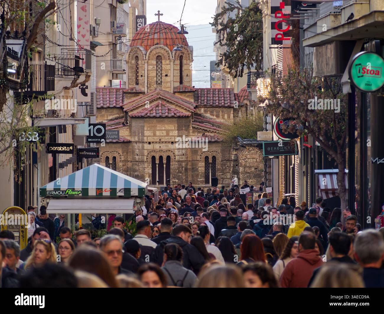 Athens, Greece - April 5, 2025: Busy urban scene with crowds walking on ...