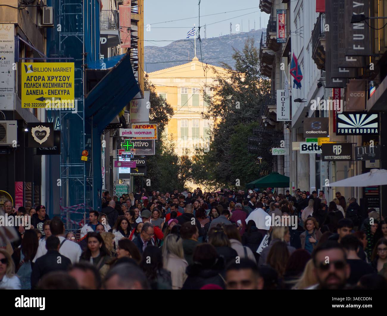 Athens, Greece - April 5, 2025: Crowded Ermou street with shops and ...