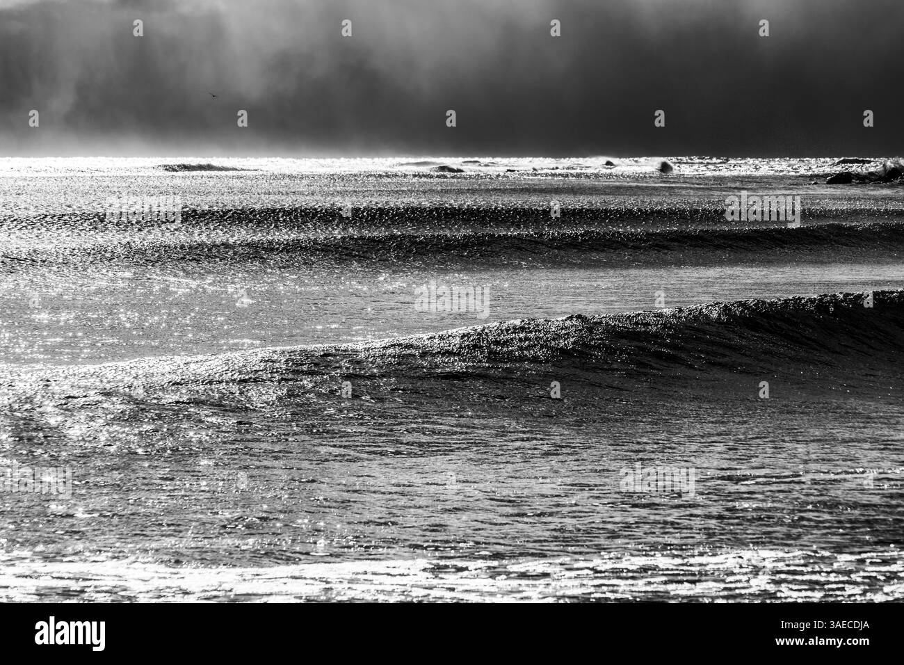 Spray surf on rocky seashore Black and White Stock Photos & Images - Alamy