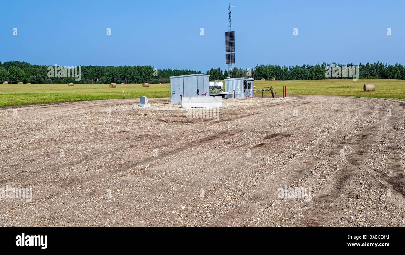 A pipeline facility is located among the farm fields in rural Alberta ...