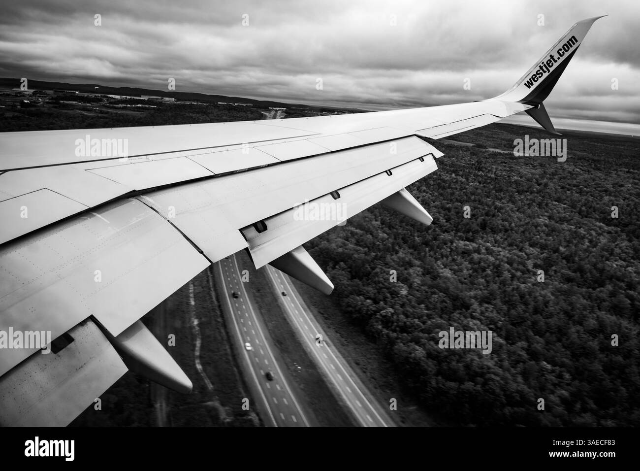 View of a highway and landscape from an airplane about to land at ...