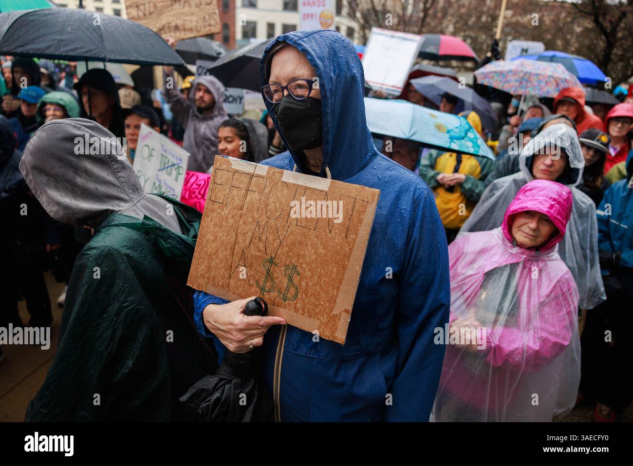 (EDITOR'S NOTE; Image contains profanity)A protester holds a placard ...
