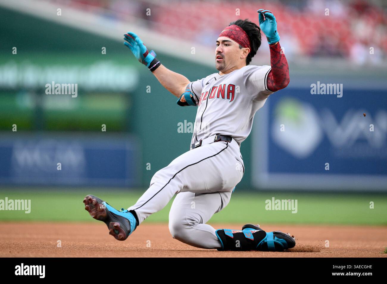 Arizona Diamondbacks' Corbin Carroll slides into third base with a ...