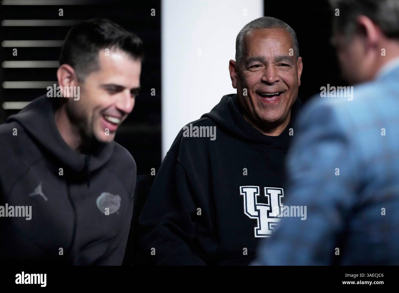 Florida head coach Todd Golden and Houston head coach Kelvin Sampson ...